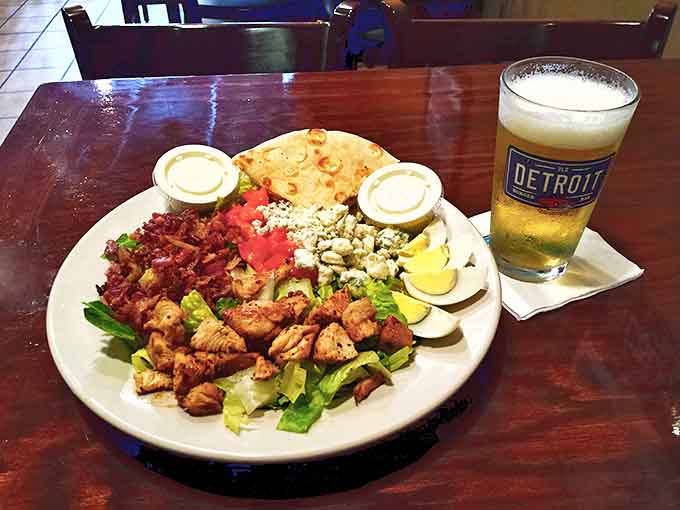 The Cobb salad offers a fresh counterpoint to burger indulgence &ndash; grilled chicken, bacon, eggs, and veggies create a substantial meal that doesn't sacrifice flavor.
