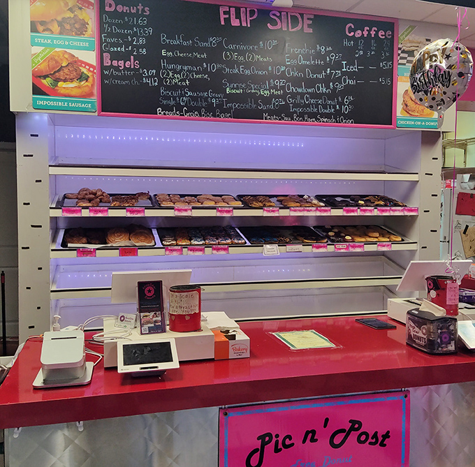 Counter: Command central for doughnut dreams, where sugar-dusted wizards transform ordinary ingredients into morning magic.