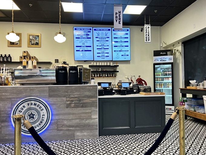 The counter area combines functionality with style &ndash; that illuminated logo practically whispers "you're in the right place" to doughnut seekers.