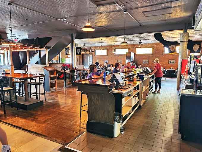 The counter area buzzes with friendly staff preparing to serve hungry guests in a space that balances efficiency with old-world charm.
