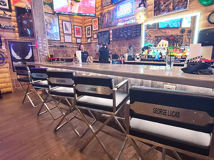 Bar stools carved from tree trunks and salvaged seats create a one-of-a-kind perch for watching the bartenders work their magic.