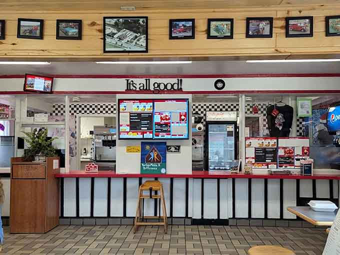 The counter area with its "It's all good!" sign and classic diner aesthetic makes ordering feel like stepping back to simpler times.