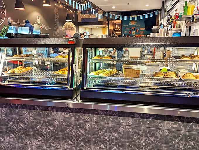 Empanada central! The display case offers a front-row view of the day's offerings, golden-brown and ready to transport you to South America.