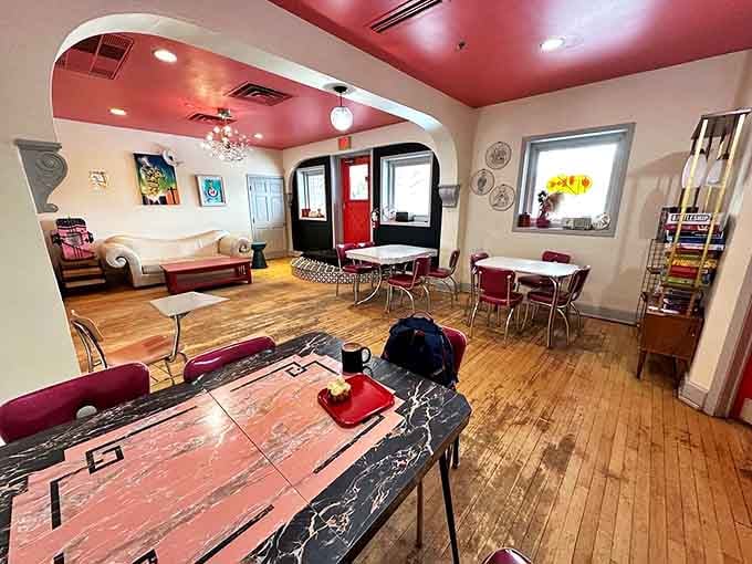 High-top tables and cozy booths invite patrons to settle in for an evening where time slows down and conversations flow freely.