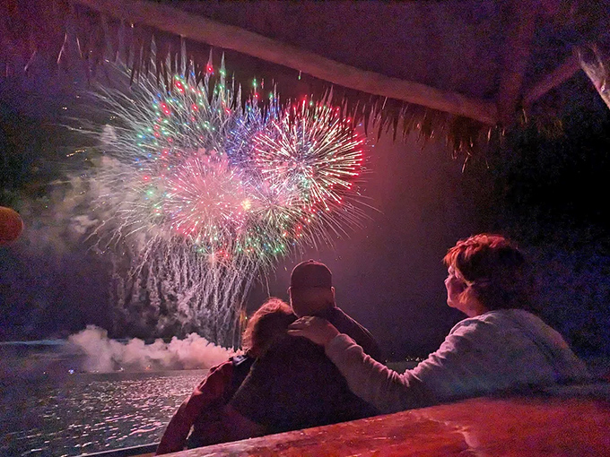 Who needs the Caribbean? Fireworks explode across the night sky, viewed from the best seat in the house – your floating tiki bar.