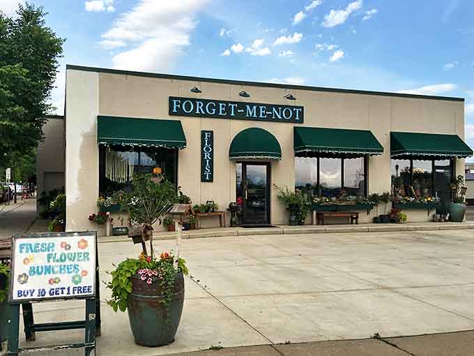 Forget-Me-Not Florist's cheerful storefront promises fresh blooms and botanical creativity, a splash of color against Northfield's historic backdrop.