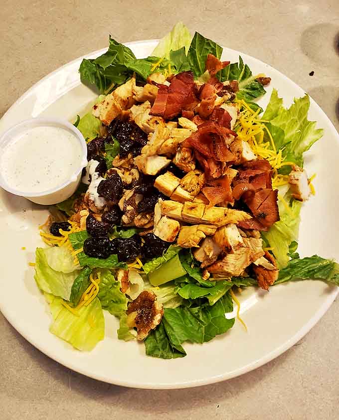 A salad that doesn't apologize for being delicious: crisp greens playing host to a party of chicken, bacon, and cheese.
