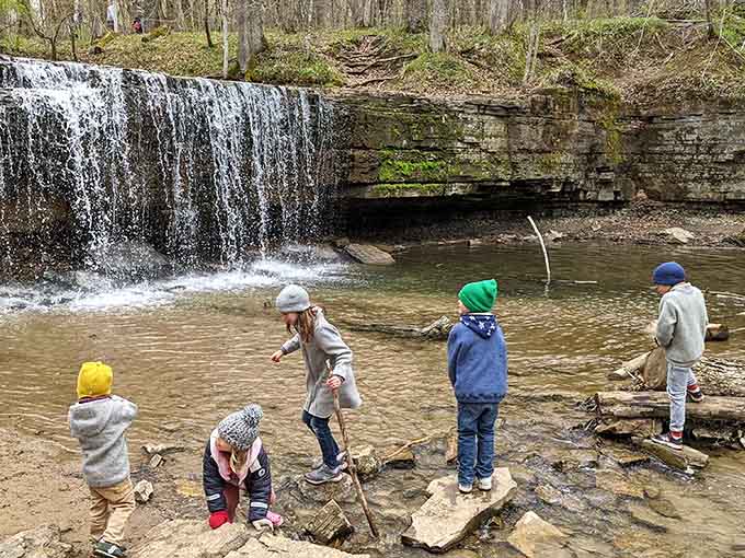 Young explorers discover that the best playground equipment doesn't need batteries or WiFi, just rocks, water, and imagination running wild.