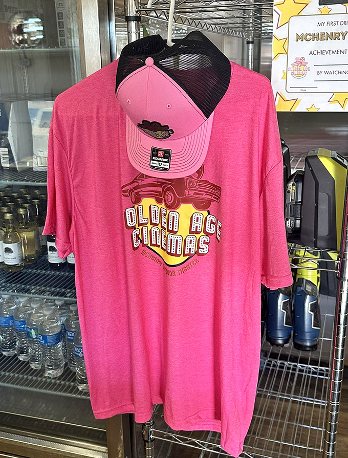Show your drive-in pride with vibrant McHenry merchandise – the pink t-shirt practically glows with retro coolness.