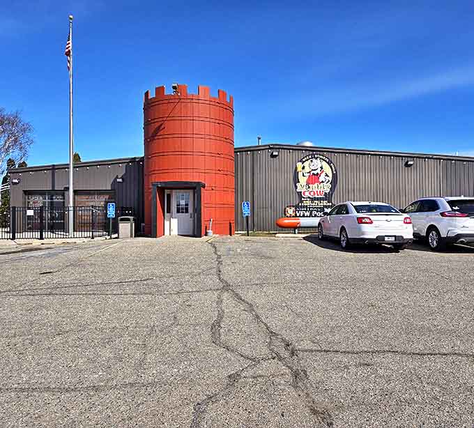 The Muddy Cow's distinctive red silo entrance stands like a beacon for hungry travelers, promising hearty fare that'll stick to your ribs through any Minnesota winter.