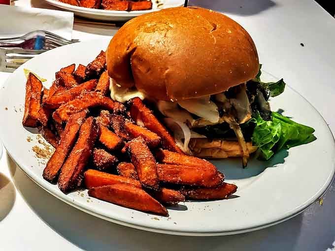 The Mushroom Onion Swiss Burger &ndash; where fungi and dairy join forces to create a flavor explosion that might just make you propose marriage to your server.