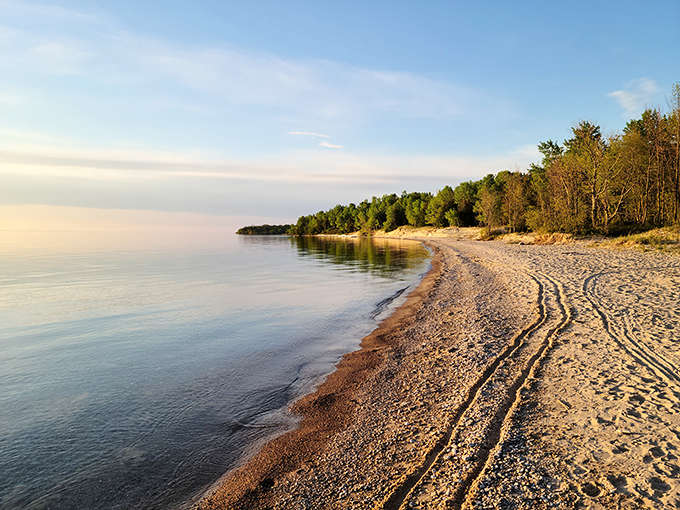 Morning light plays across the shoreline, creating the walking path you didn't know your soul needed.