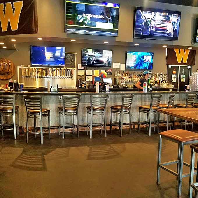 The front row seats to the liquid magic show, where taps flow and cocktails materialize before your very eyes.