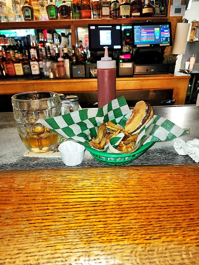 Olive burger with Fries: Michigan's unique contribution to burger culture &ndash; savory olives and mayo create a tangy masterpiece that locals crave.