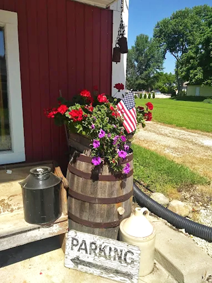 Even the parking signage carries vintage charm &ndash; a weathered wooden directive that feels more like an invitation than an order.