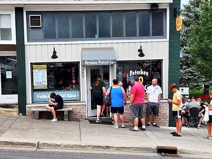 The line forming outside isn't just about hunger &ndash; it's a testament to reputation and the willing patience of those seeking Michigan's best pretzels.