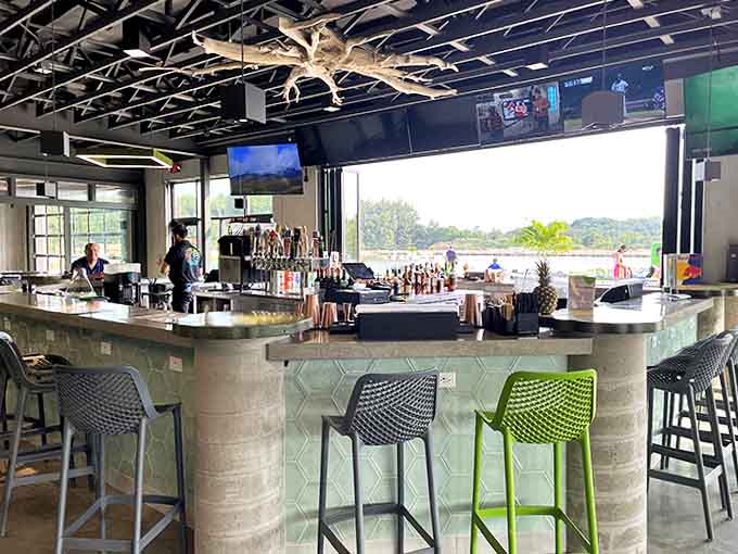 The resort bar: where parents rehydrate with adult beverages while watching their children burn endless energy outside.