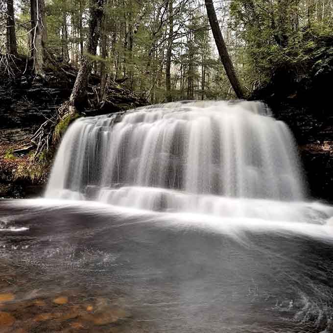 The waterfall performs its endless dance, a timeless performance that began long before humans arrived and will continue long after we're gone.