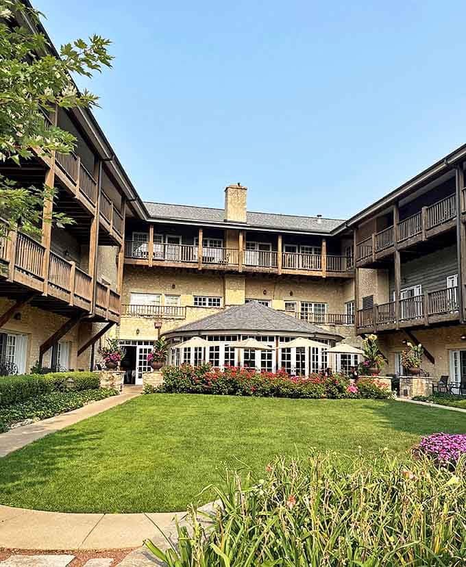 The inn's courtyard reveals its thoughtful design, where balconies overlook a central garden space that feels worlds away from everyday stress.