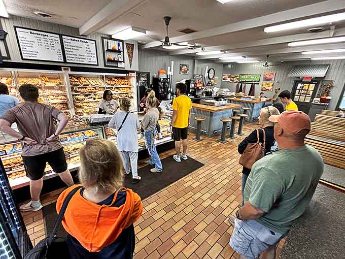 The line forms for good reason &ndash; these customers aren't just waiting for donuts, they're queuing for transcendent experiences disguised as breakfast.