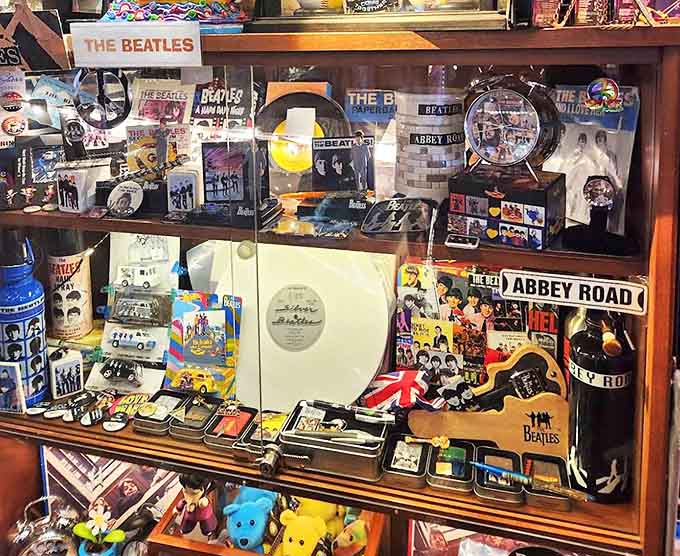 The merchandise display tempts fans to take home a piece of the experience &ndash; from mugs to magnets celebrating the band that changed music forever.