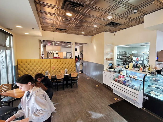 The dining room's metallic ceiling tiles and warm lighting create an atmosphere where you'll want to linger long after your plate is clean.