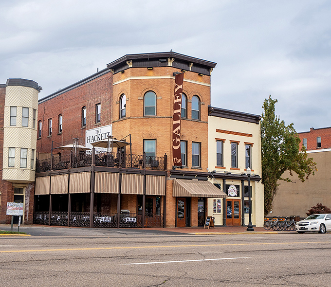 The Galley's brick exterior hints at the culinary delights waiting inside, where river views complement meals that satisfy both hunger and nostalgia.