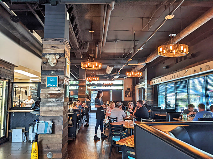 The dining room hums with conversation and clinking glasses, creating that perfect restaurant soundtrack of happiness and satisfaction.