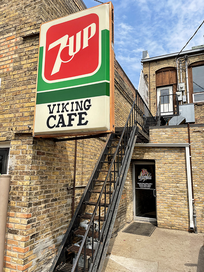The Viking Cafe's vintage 7UP sign has witnessed decades of downtown life while serving comfort food that could fuel actual Vikings.