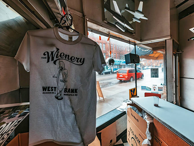 The Wienery's West Bank t-shirt hangs in the window, a badge of honor for those who've discovered this Minneapolis culinary institution.