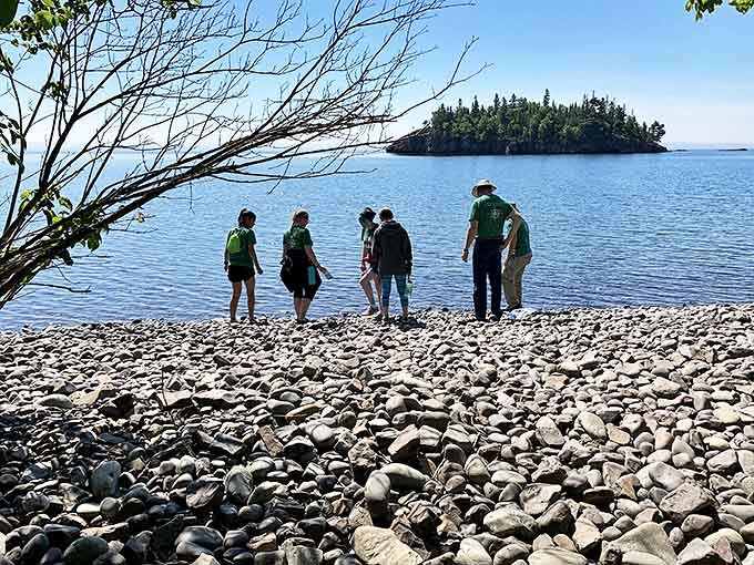 Explorers at the edge: Visitors gather to contemplate the vastness of America's greatest lake from its most picturesque shore.