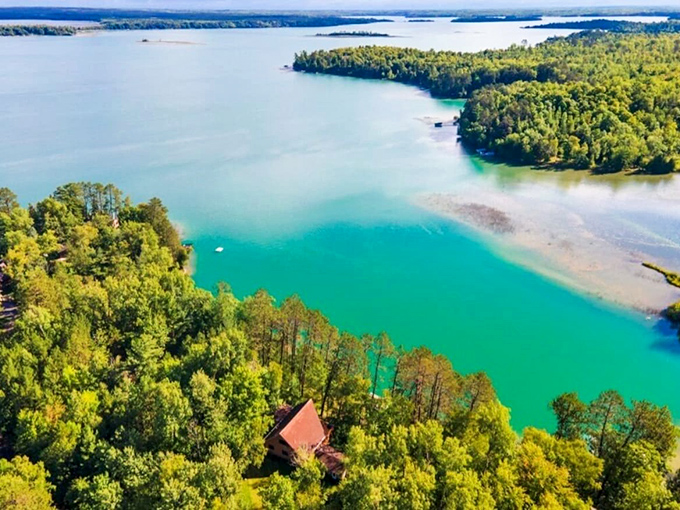 Aerial magic reveals Deer Lake's true colors &ndash; a painter's palette of turquoise and emerald nestled among Minnesota's northern forests.