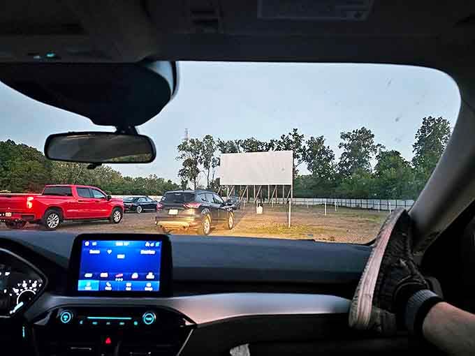 The view from inside arriving cars captures that moment of anticipation &ndash; the screen waiting in the distance, promising an evening of entertainment.