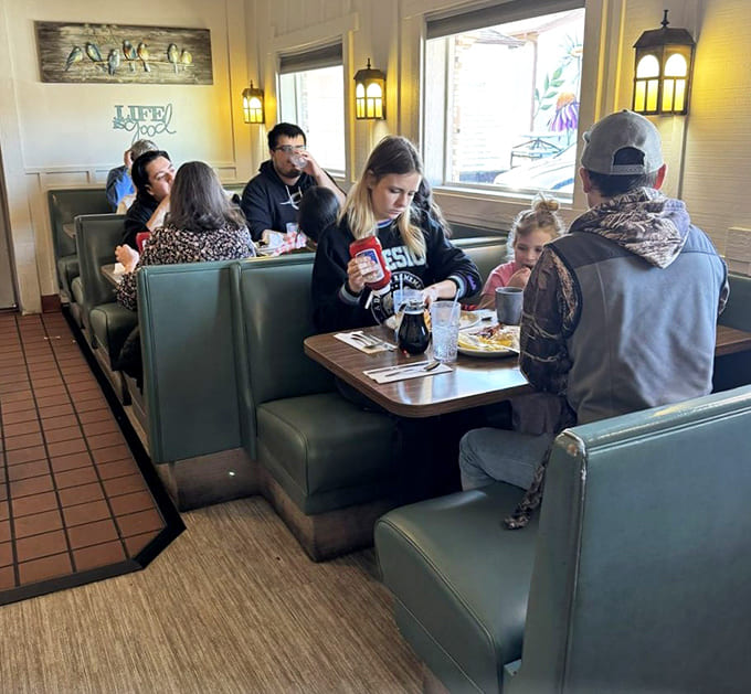 Families and locals fill the comfortable booths, creating that perfect diner symphony of conversation, laughter, and the occasional "pass the syrup."