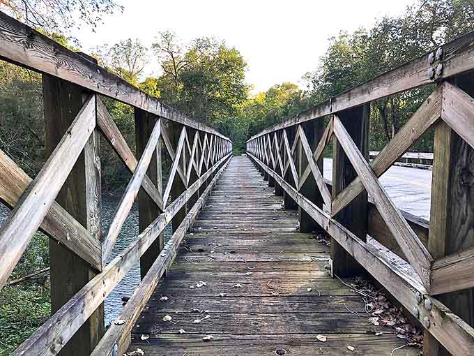 Crossing over: This rustic wooden footbridge invites visitors to traverse the clear waters of the South Branch Root River.