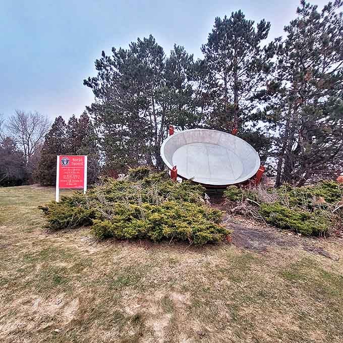 Winter or summer, the massive pie pan maintains its silent vigil, a year-round reminder of Traverse City's cherry obsession.