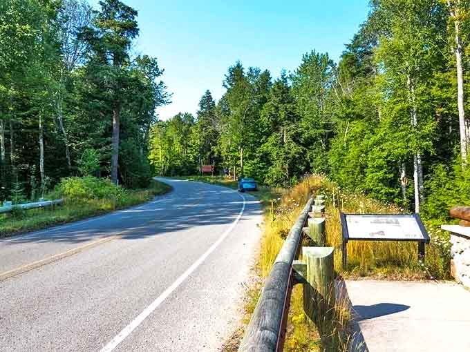 The road hugs the landscape like it was meant to be there, offering tantalizing glimpses of adventures waiting just beyond the next curve.