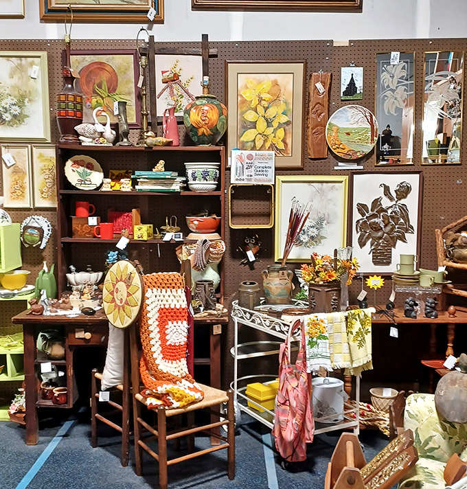 Every shelf and surface holds potential treasures, from handcrafted pottery to folk art pieces that showcase American craftsmanship through the decades.