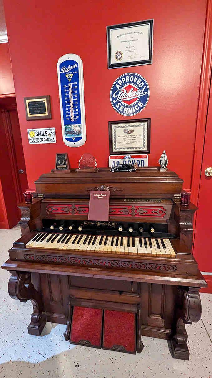 This antique reed organ once provided the soundtrack to countless memorial services, its wooden cabinet housing both music and memories.