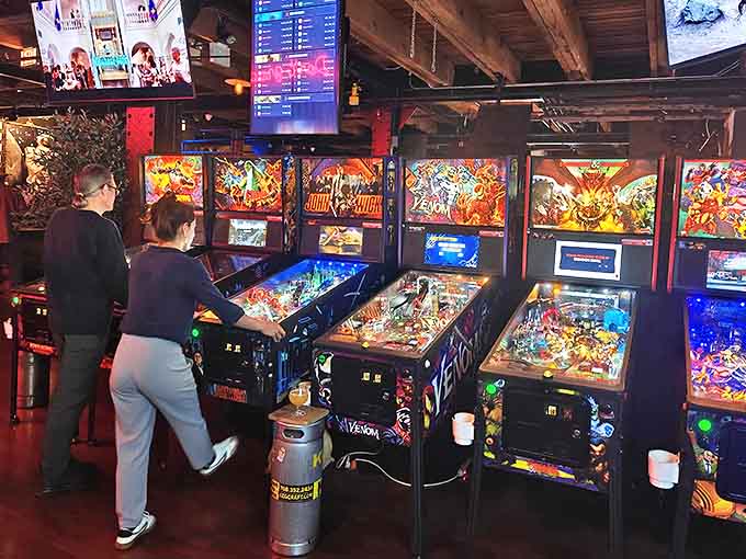 Vintage pinball machines stand ready to transport players back to simpler times when high scores were life's biggest challenge.