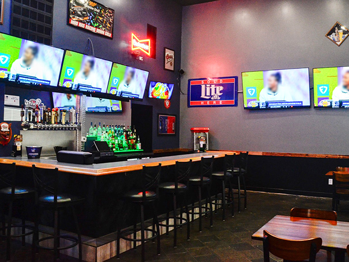 The bar area, with its multiple screens and impressive selection, creates the perfect perch for catching the game while sampling through the menu.