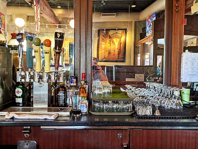 The bar gleams with promise &ndash; each bottle and tap representing potential pleasure, with bartenders who remember your preferences like old friends.