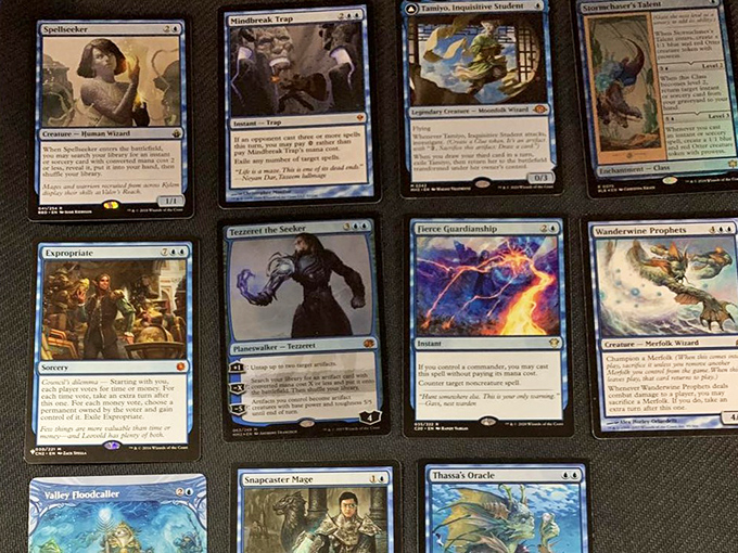 Magic: The Gathering cards display their mesmerizing artwork, each one a miniature masterpiece that doubles as a strategic game piece.