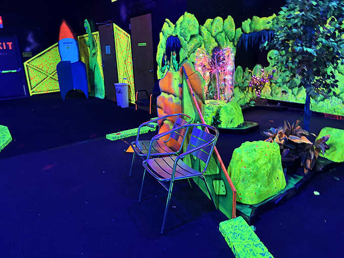 Even the seating gets the alien treatment! These otherworldly chairs provide the perfect resting spot between intergalactic putting adventures.