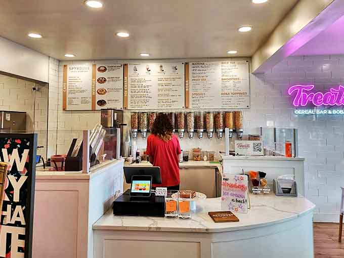 The pristine counter and cereal dispensers stand ready for action, like a laboratory dedicated to the serious science of sugary delight.