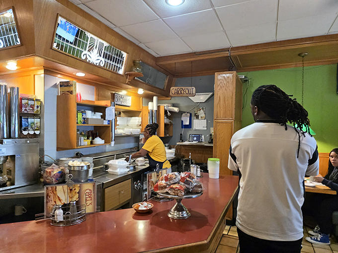 At the counter, where regulars perch and servers work their magic, breakfast becomes performance art.