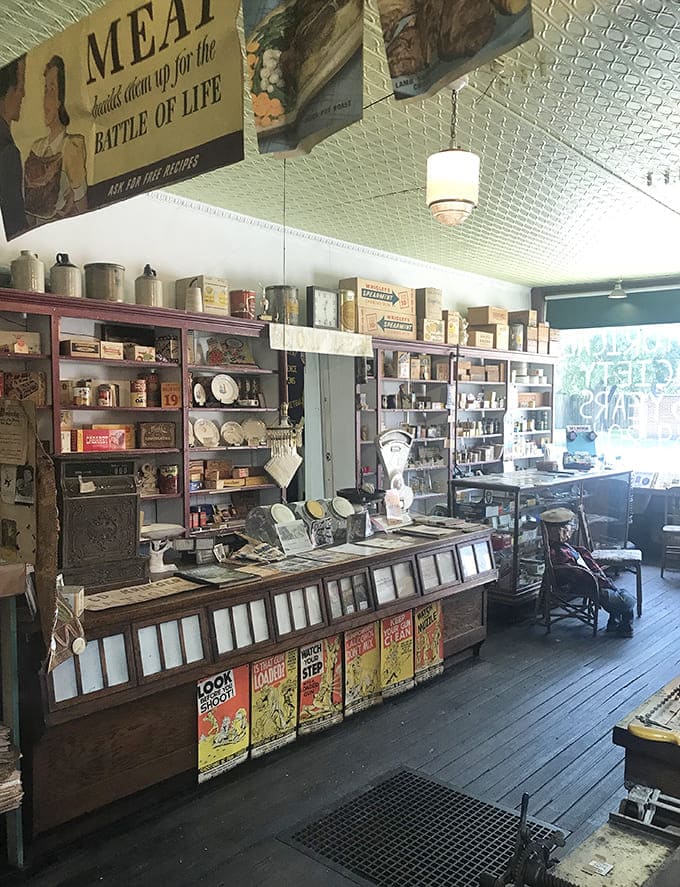 Pressed tin ceilings crown shelves of vintage products – a general store frozen in time when shopping meant conversation and community.