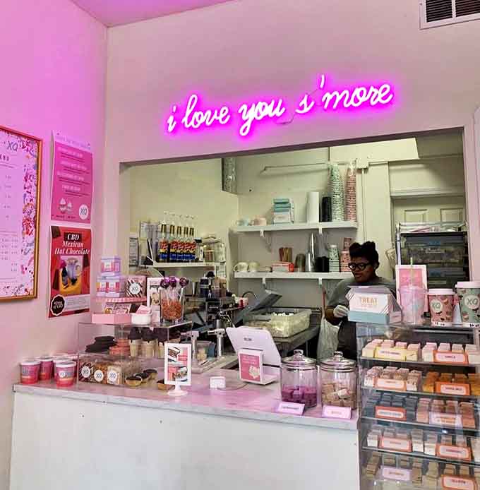 Under the glow of "i love you s'more," the counter displays treats that transform the humble marshmallow into works of edible art.