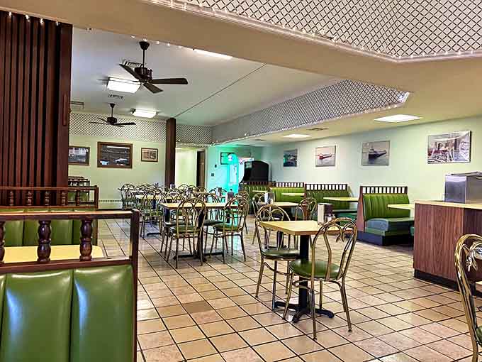 The dining room hums with conversations spanning decades – some booths have heard more Duluth secrets than any therapist.