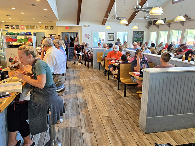 The dining room buzzes with the happy symphony of forks meeting plates and conversation flowing as freely as the coffee.